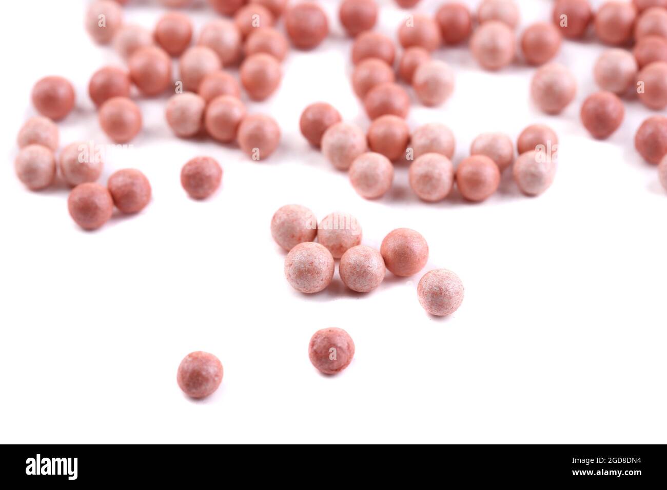 Powder balls isolated on white Stock Photo - Alamy