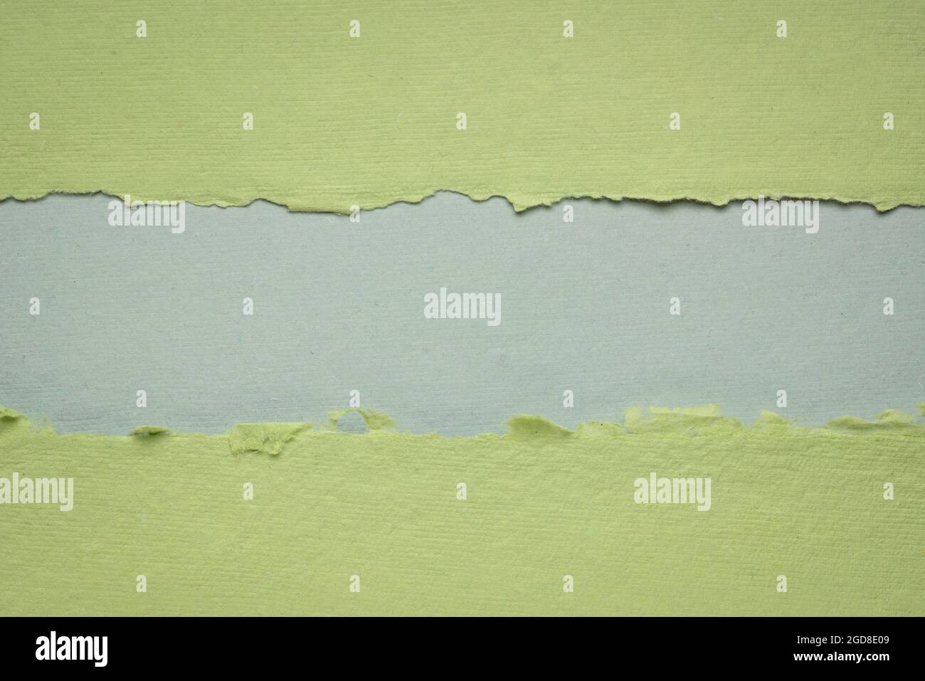 paper abstract in pastel green tones with a copy space - sheets of ...