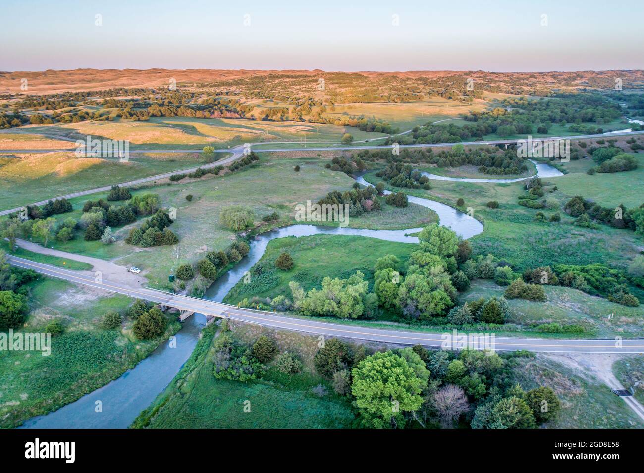 aerial view of a highway and bridges over the Dismal River in Nebraska ...