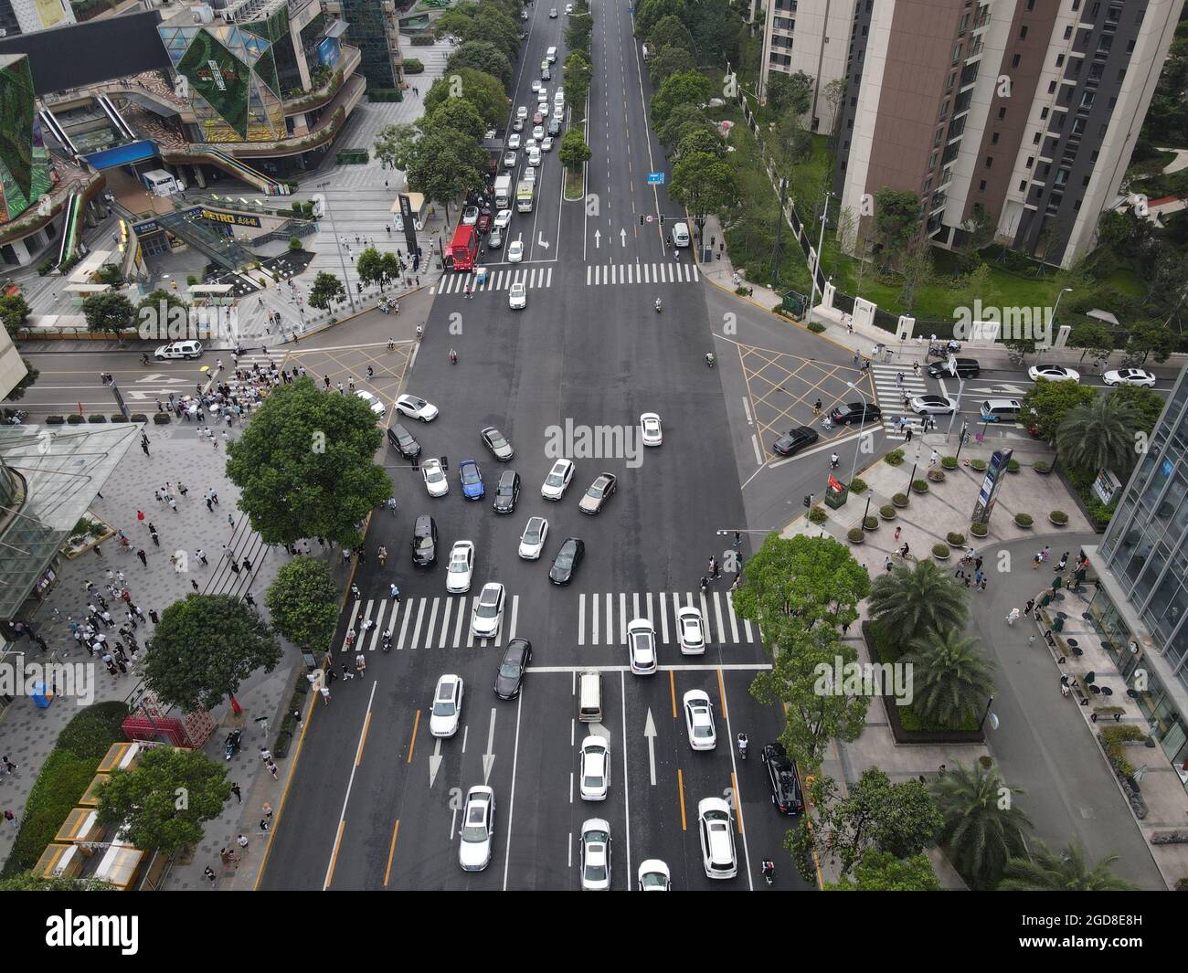 Residents from the lockdown area walk out of the street to celebrate ...
