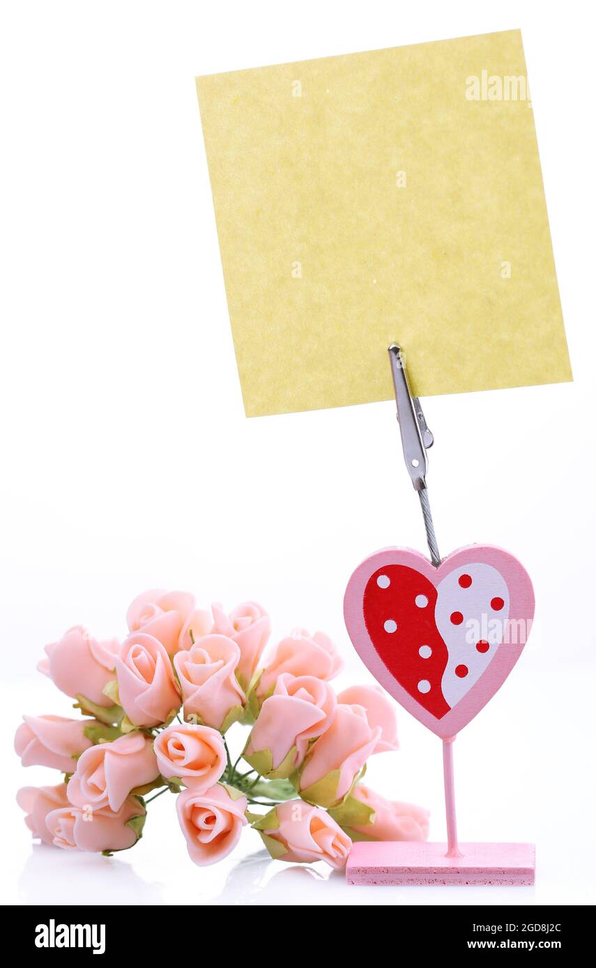 Empty note paper attached to message holder isolated on white Stock ...