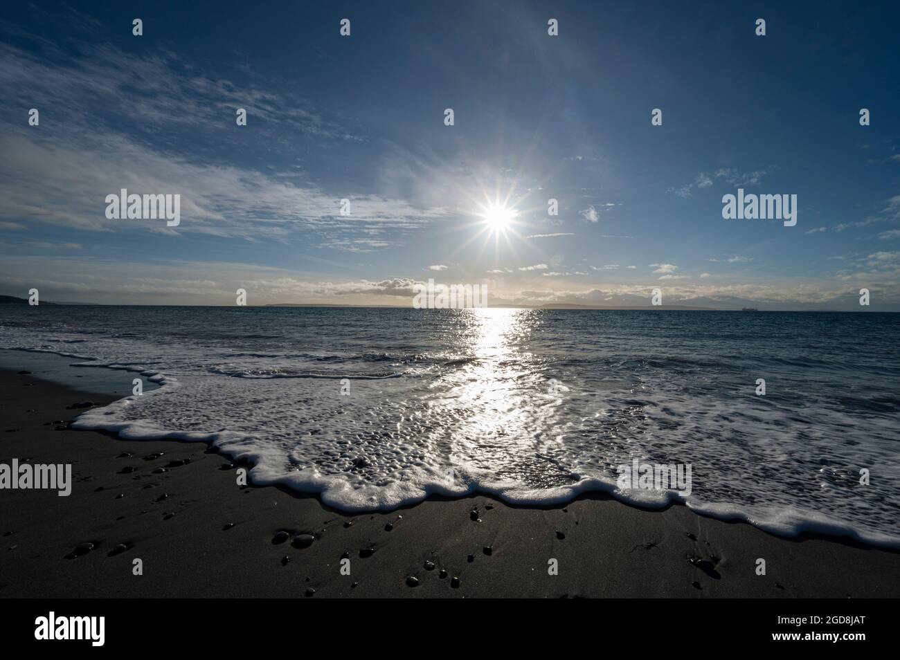 sunset at the beach in the pacific northwest Stock Photo - Alamy