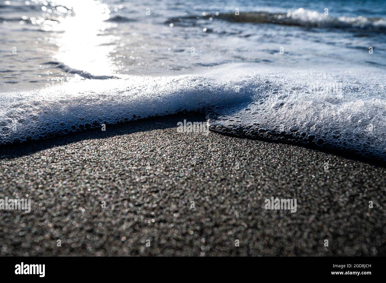 small waves on the beach Stock Photo - Alamy