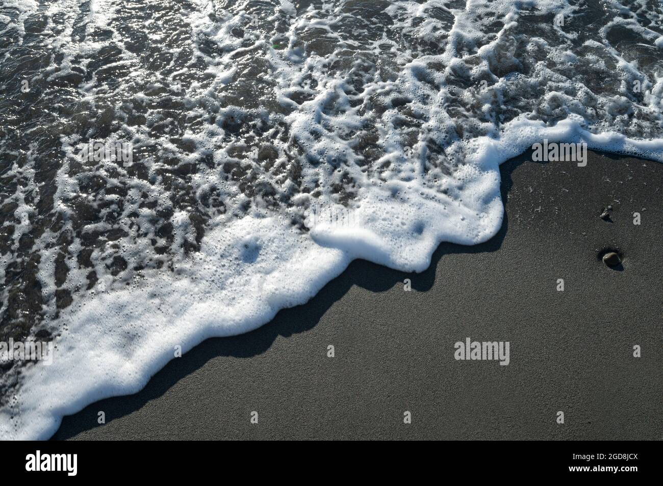 small waves on the beach Stock Photo - Alamy