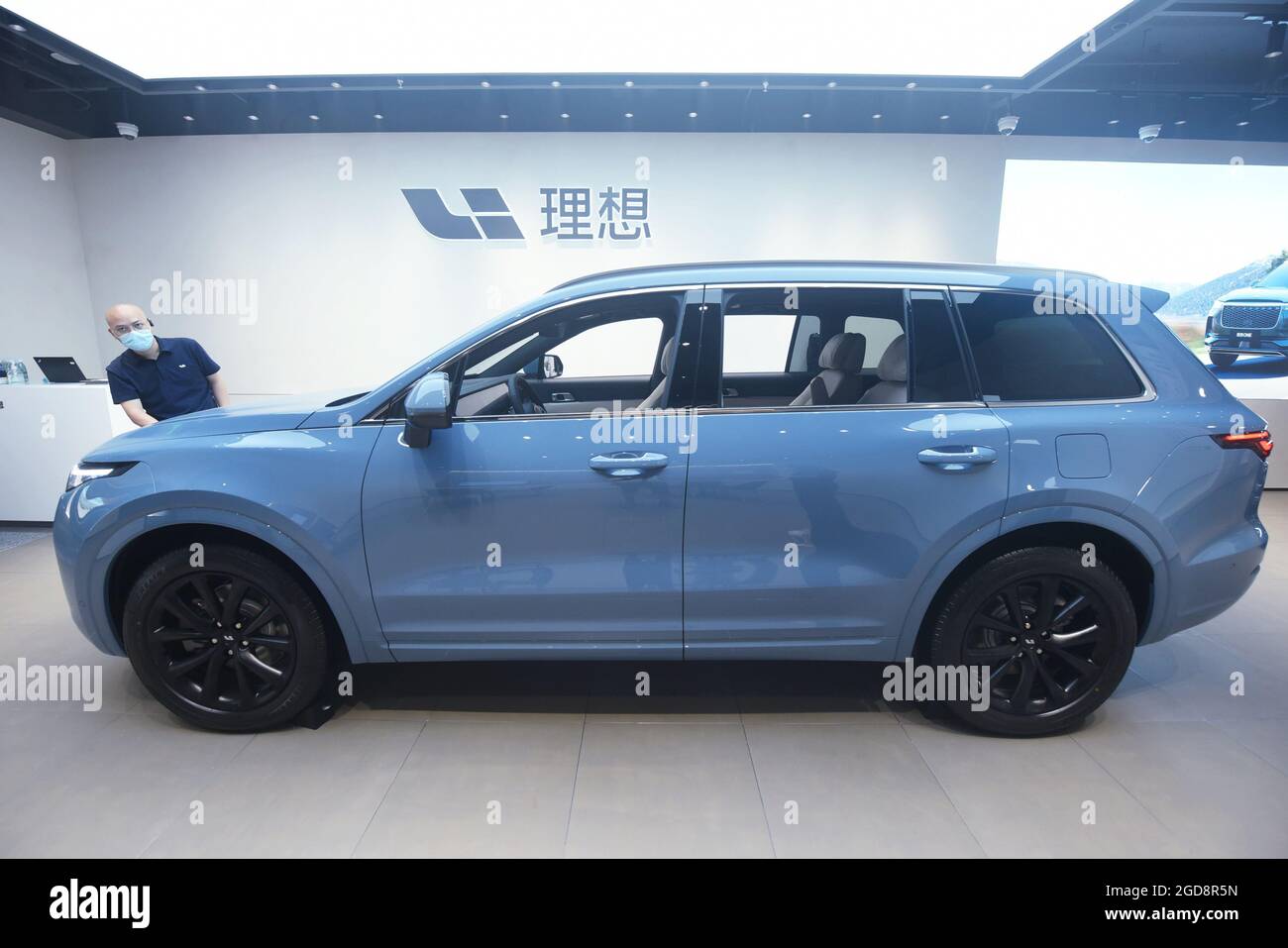 HANGZHOU, CHINA - AUGUST 12, 2021 - Customers view Lixiang One, an ...