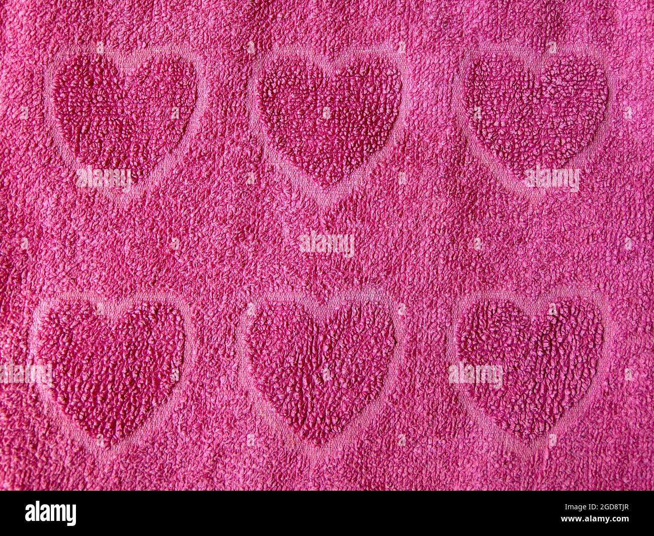heart shapes on a pink towel Stock Photo - Alamy