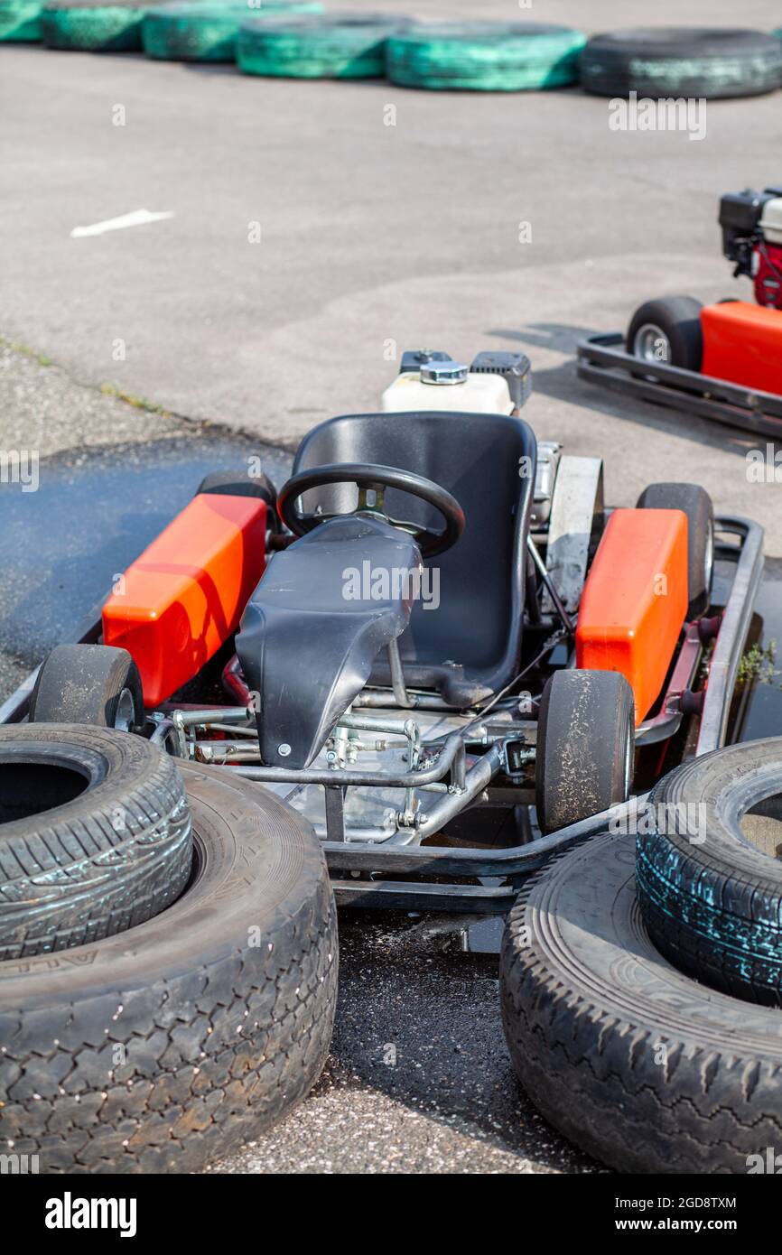 A go-karting car is standing on the highway and waiting for the driver ...