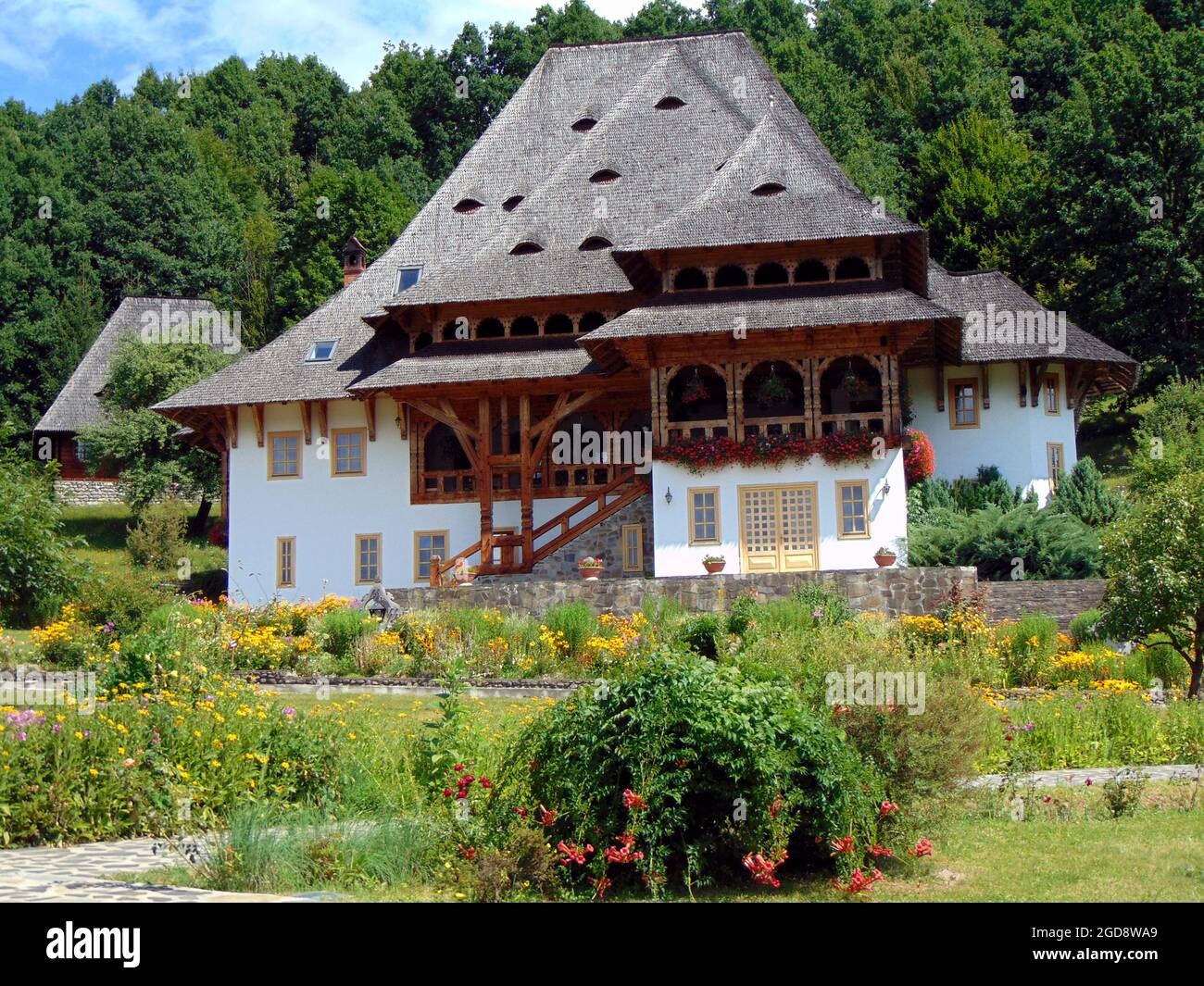 Wooden building at Barsana orthodox monastery, Maramures Stock Photo ...