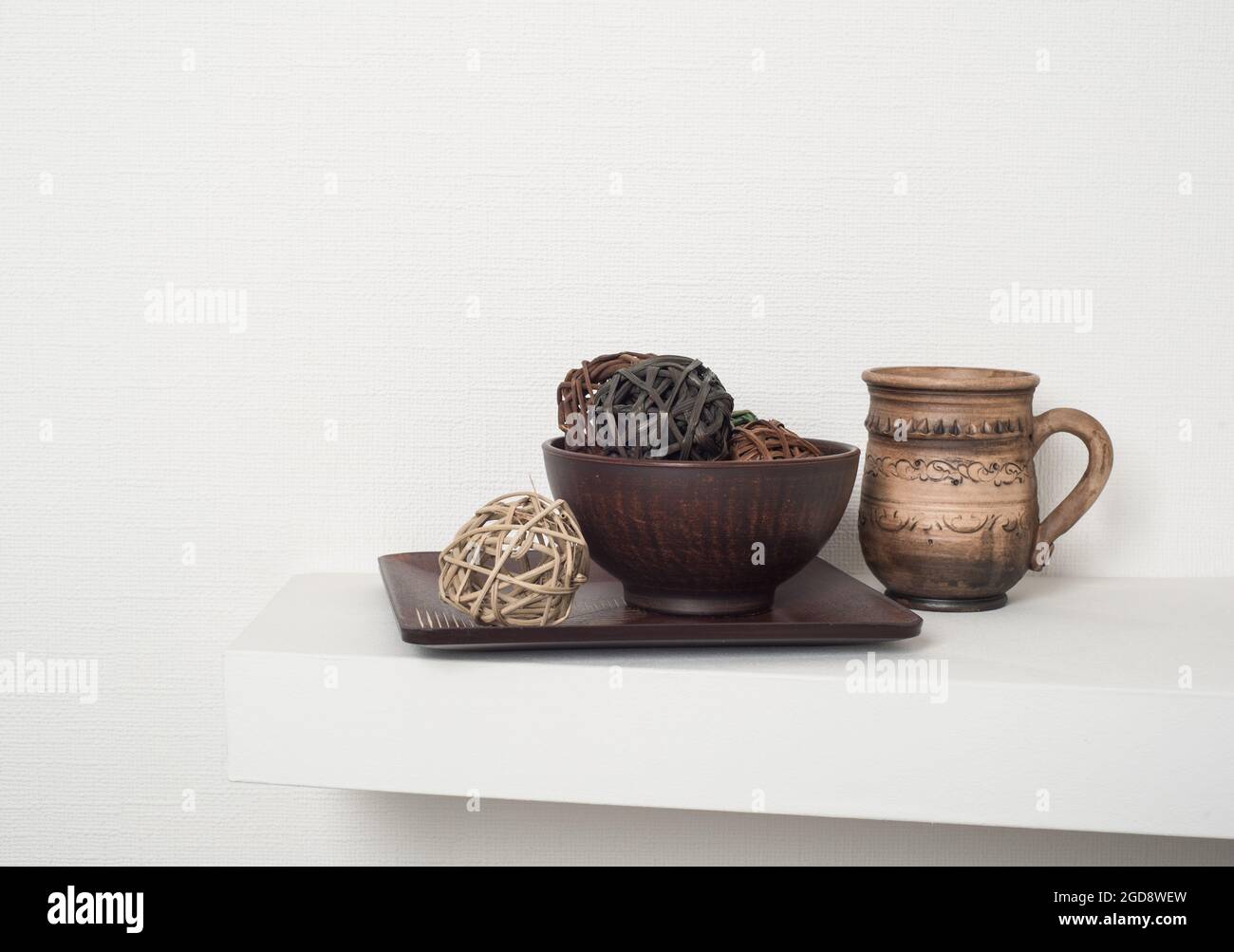 Decoration of rustic pottery in white interior Stock Photo - Alamy