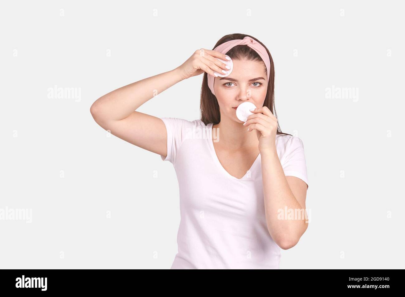 Pretty young woman gesture. Studio portrait. Female person Stock Photo ...