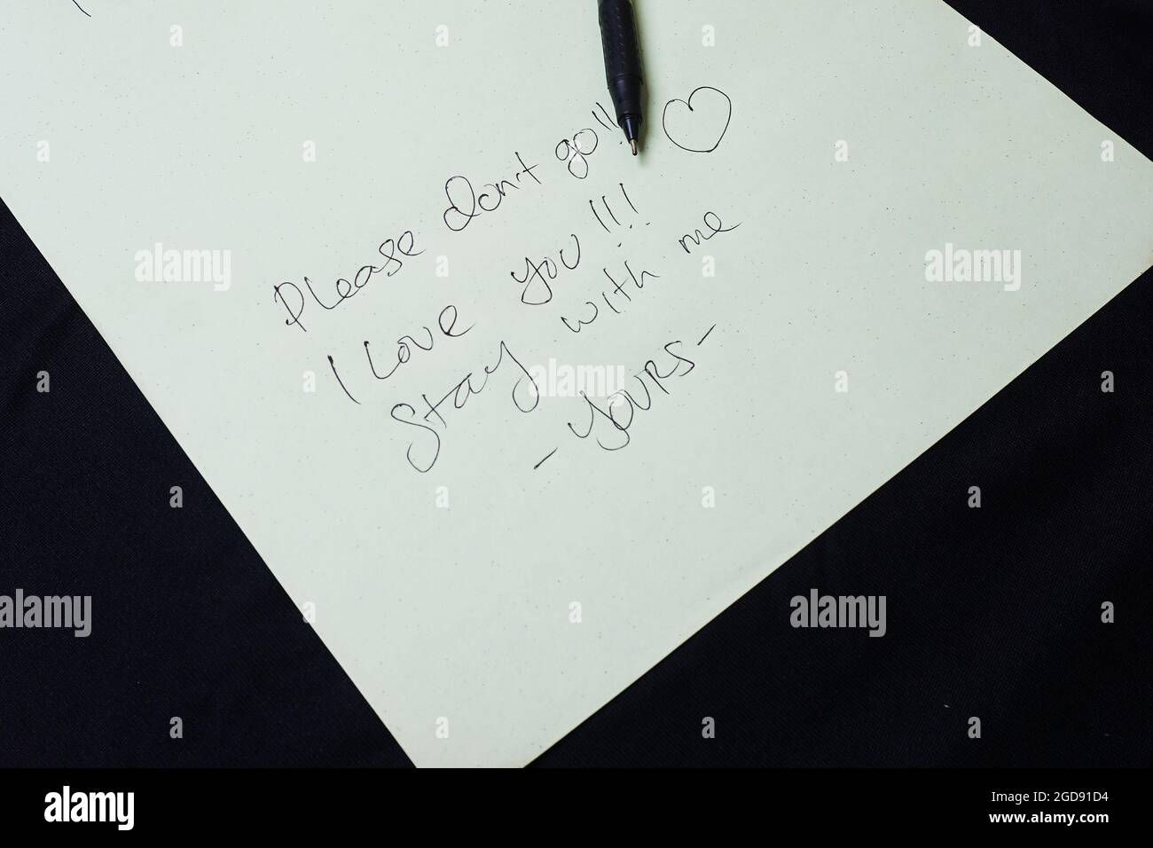 Love letter words, handwriting message on paper Stock Photo - Alamy