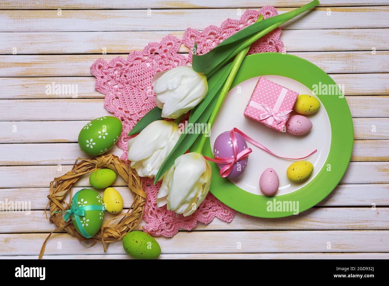 Easter table setting with tulips and eggs Stock Photo - Alamy