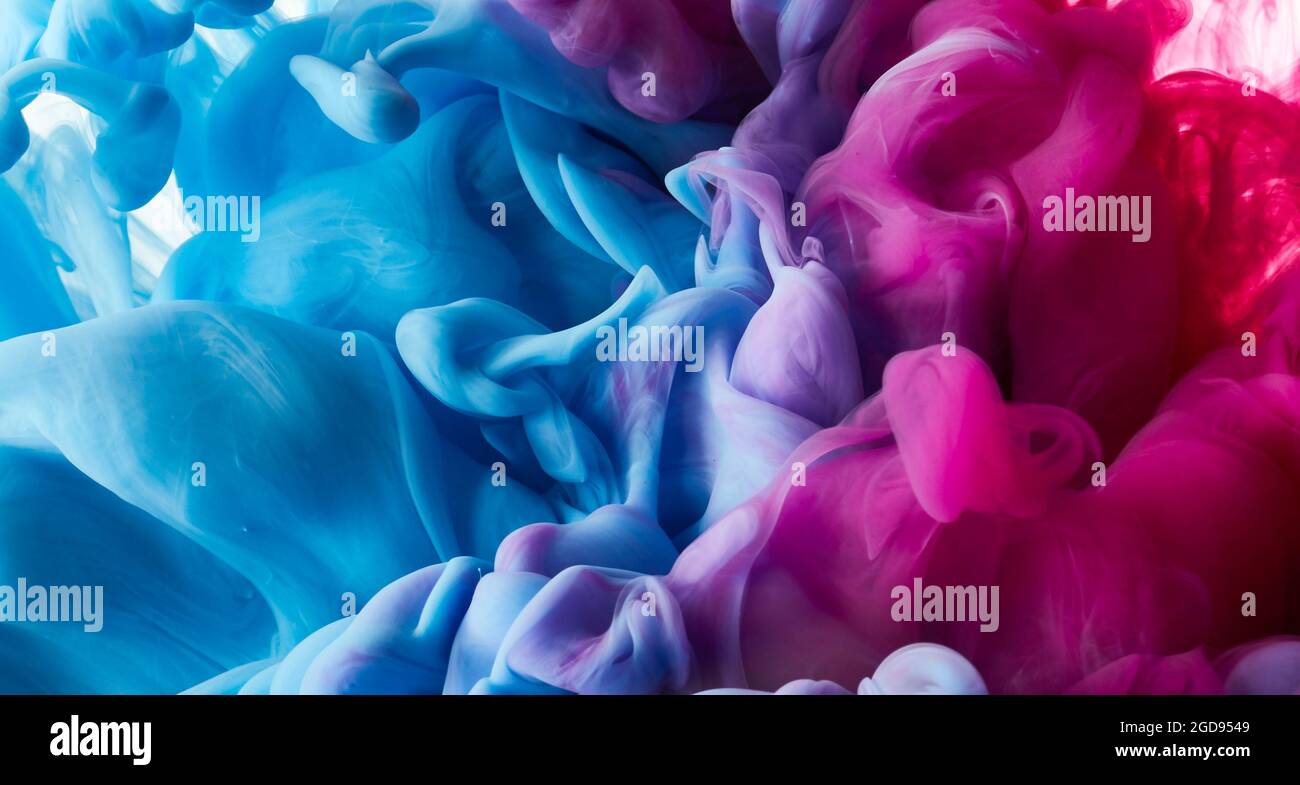 Ink drop in water background Stock Photo - Alamy
