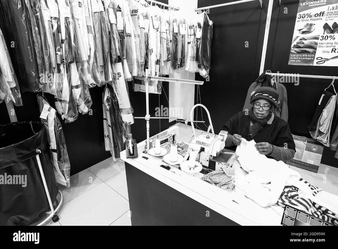 JOHANNESBURG, SOUTH AFRICA - Jan 06, 2021: An African man repairing ...