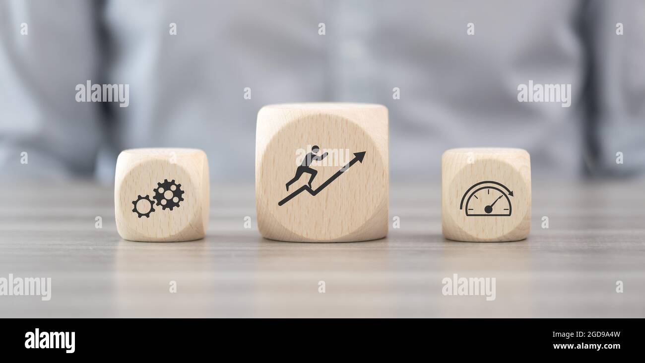 Wooden blocks with symbol of motivation concept Stock Photo - Alamy