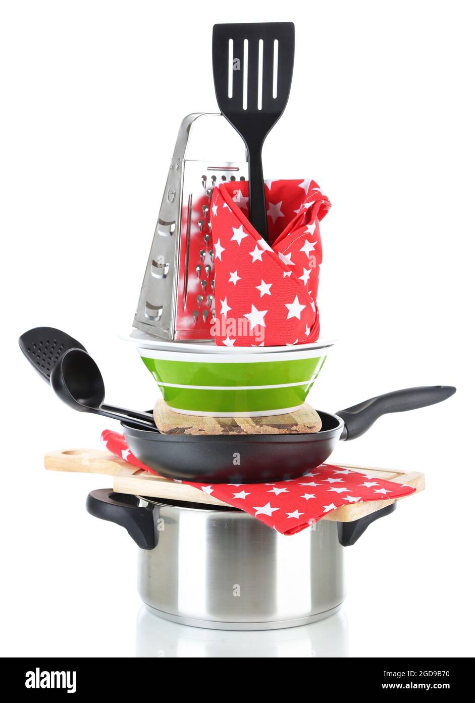 Stacked cooking equipment isolated on white Stock Photo - Alamy