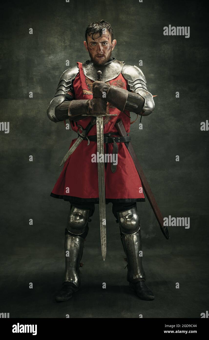 Portrait of one brutal bearded man, medeival warrior or knight with ...