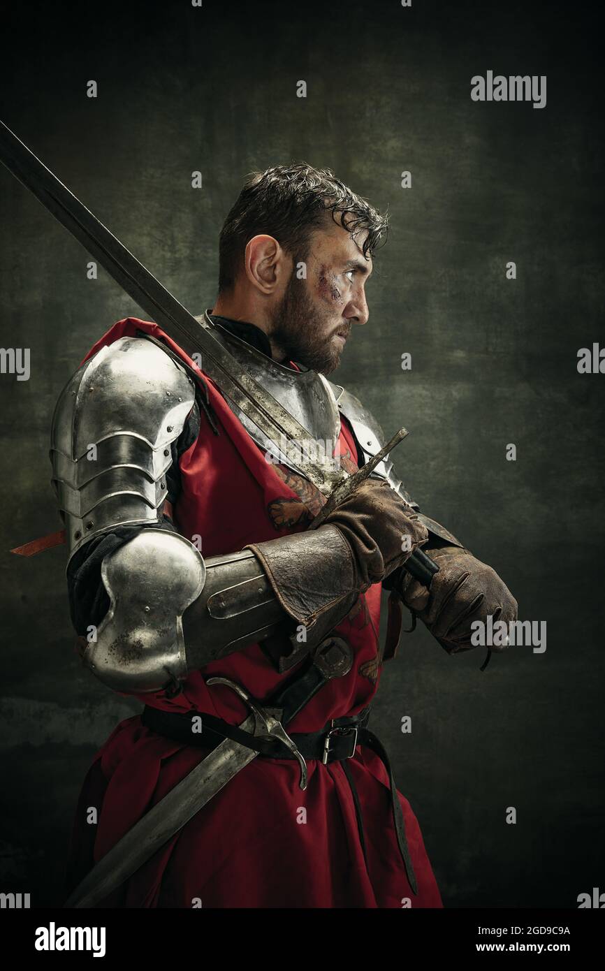 Side view. Portrait of one brutal bearded man, medeival warrior or ...