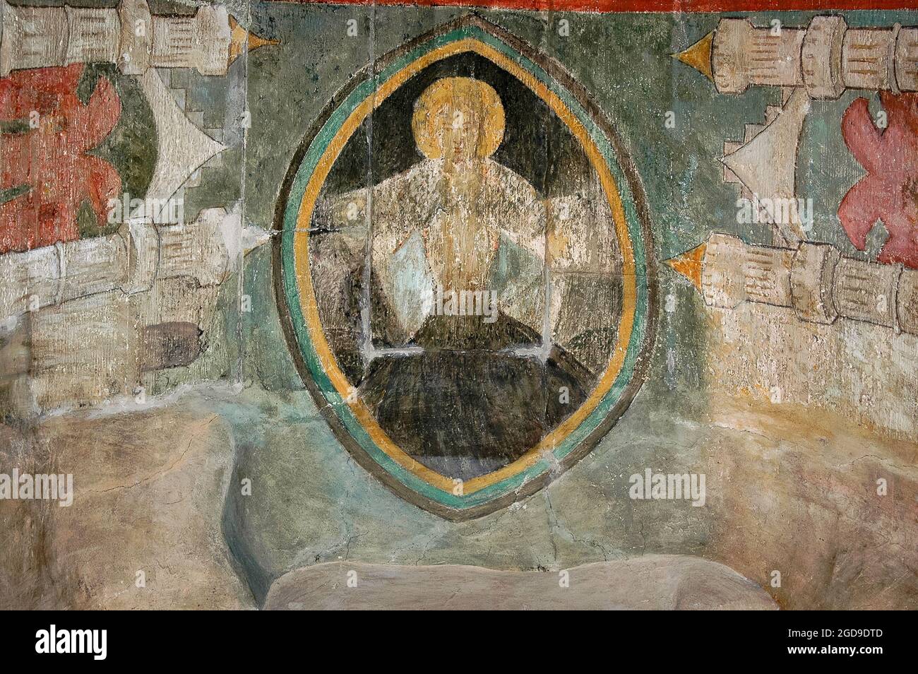 Angel in almond-shaped mandorla frame, flanked by soaring medieval ...