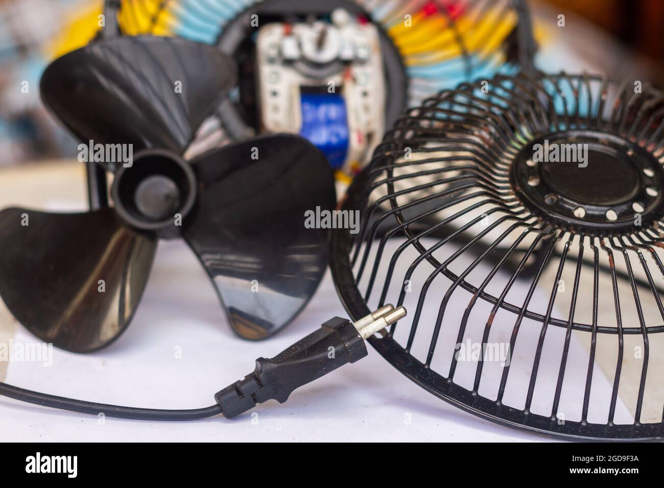 Broken fans pile up into trash that is difficult to dispose of, made of ...