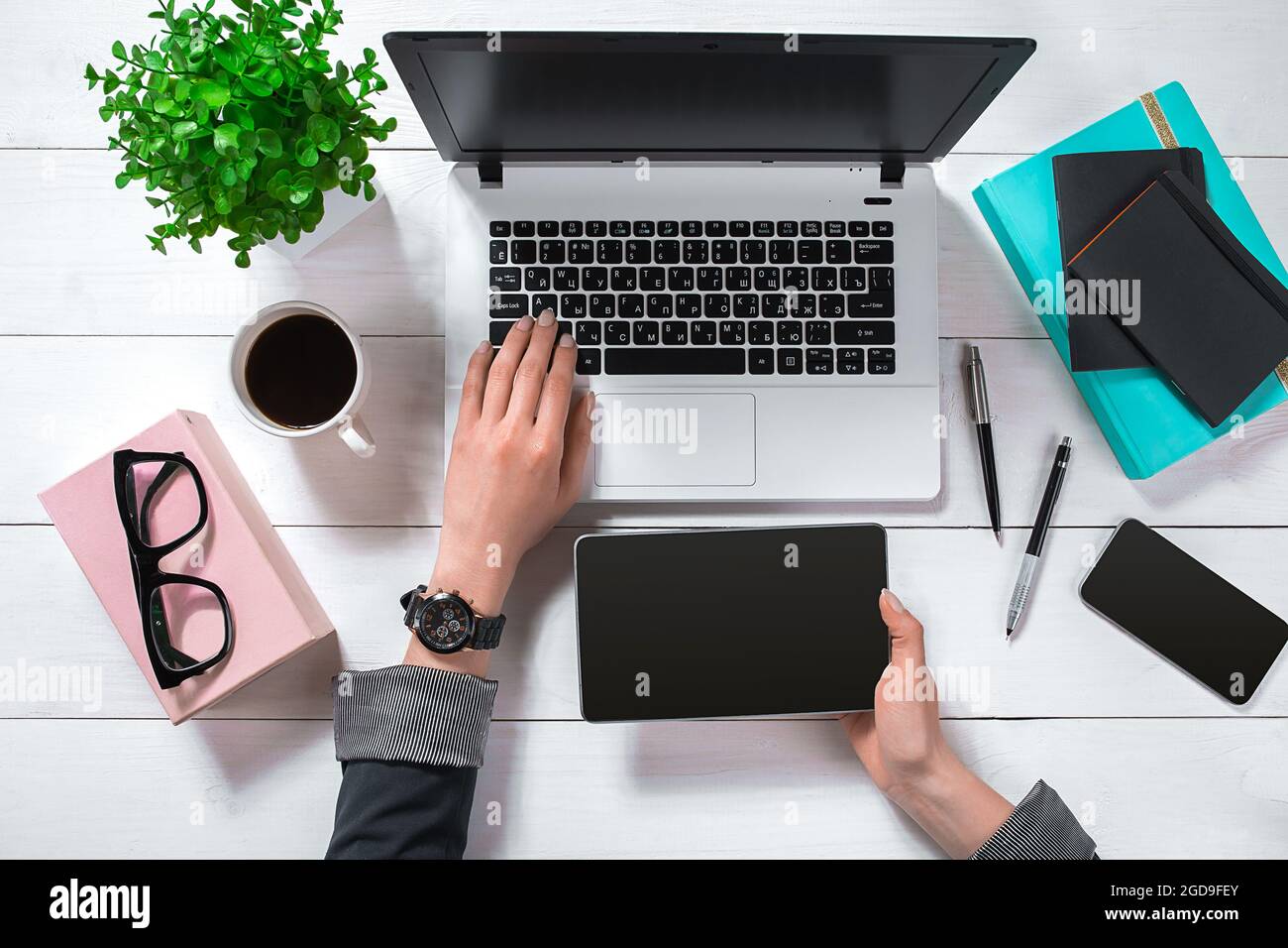 Overhead view of businesswoman working at computer in office Stock ...