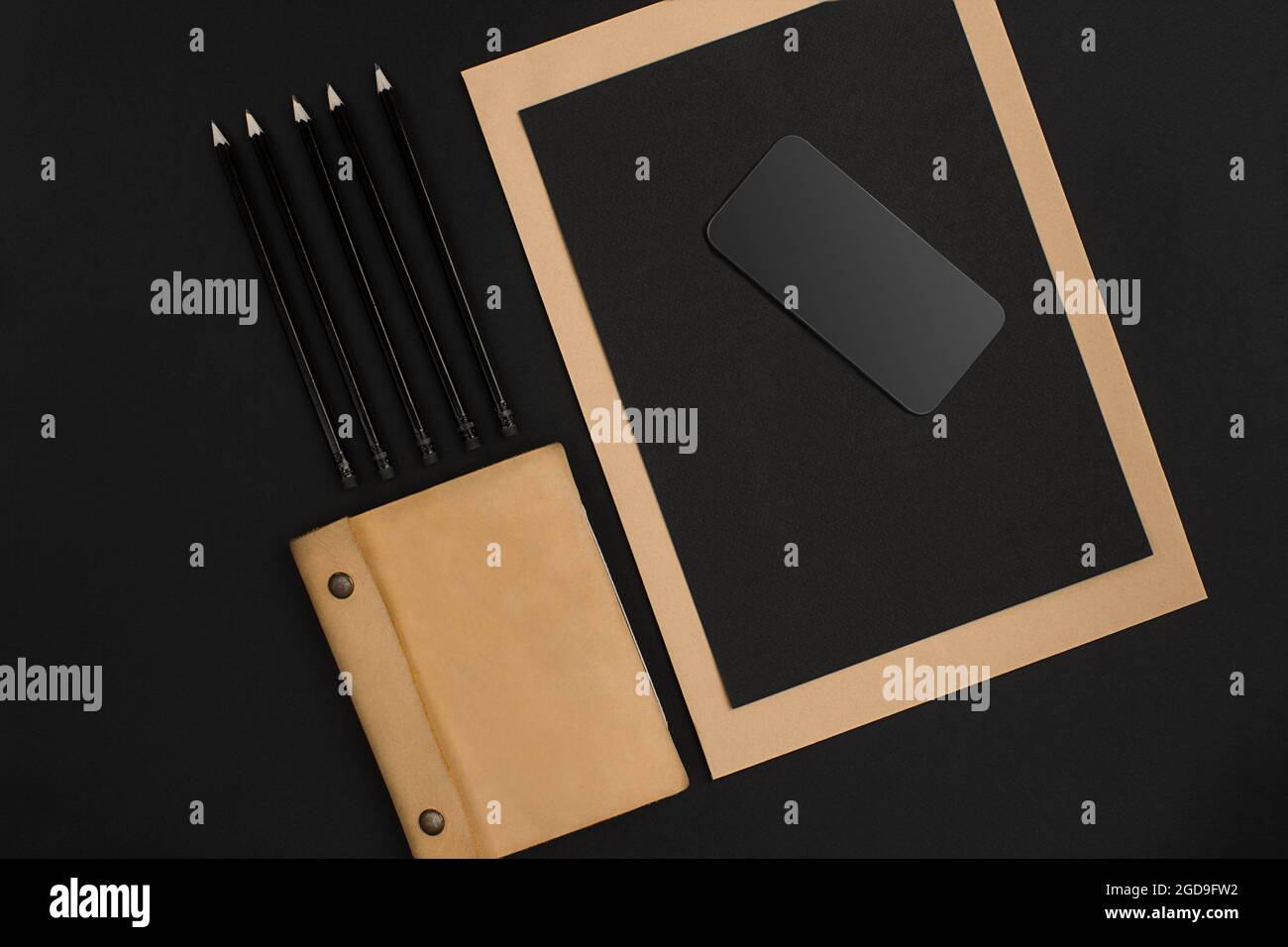 Mix of office supplies on a modern desk Stock Photo - Alamy