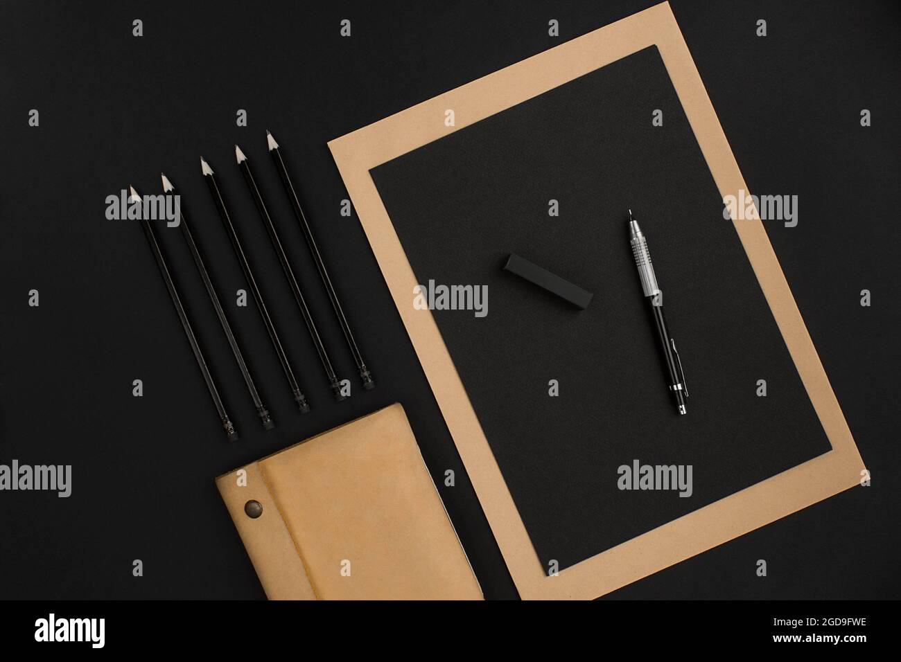 Mix of office supplies on a modern desk Stock Photo - Alamy