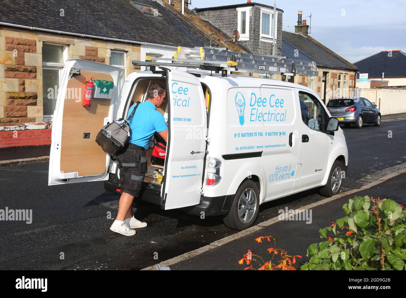 Ayr, Ayrshire, Scotland, UK , An electrician uses his all electric van ...
