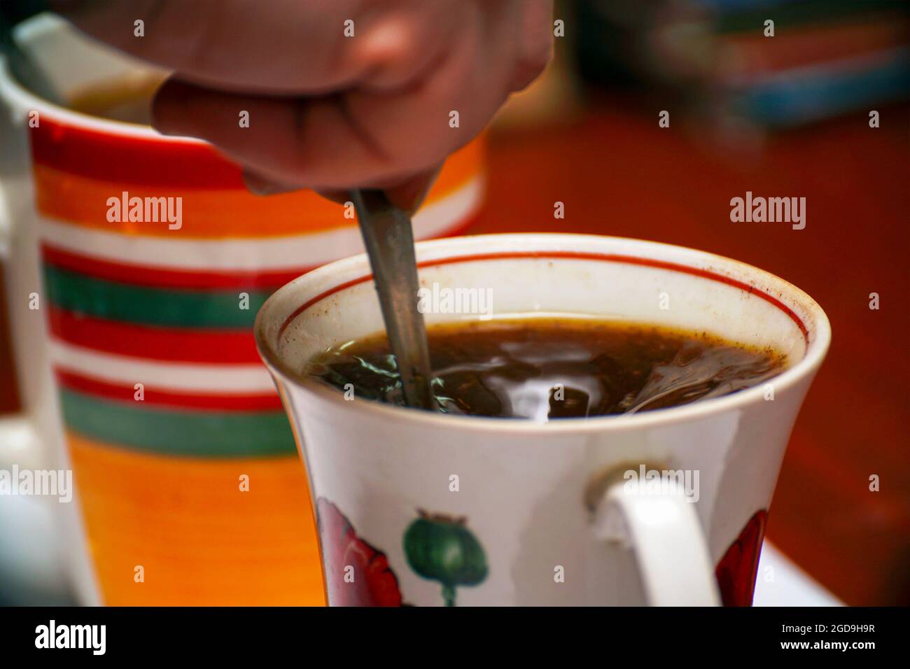 Woman stir sugar in white hi-res stock photography and images - Alamy