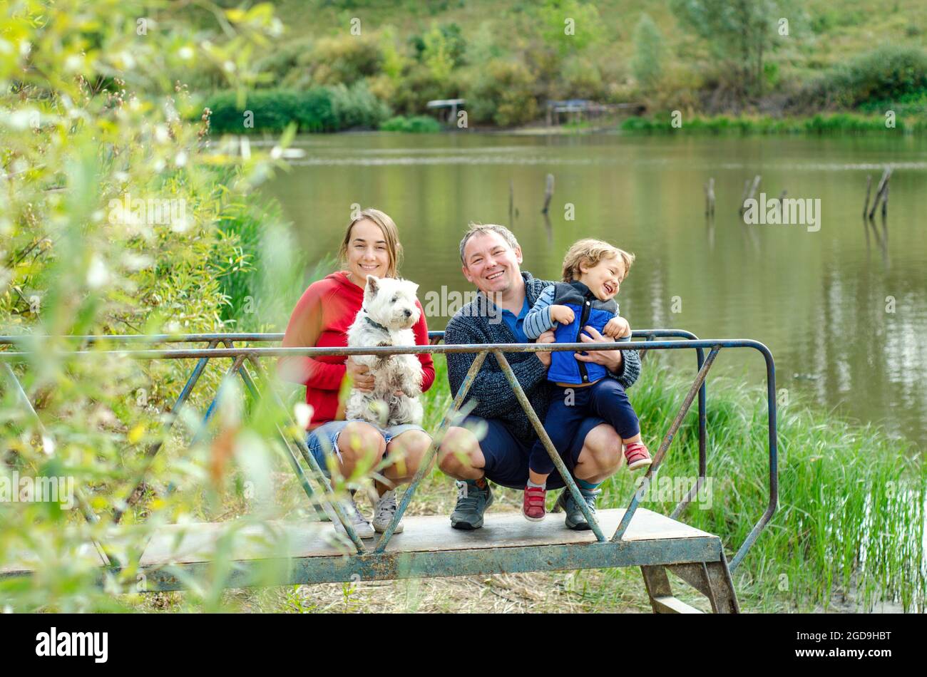 happy family enjoying weekend outdoors Stock Photo - Alamy