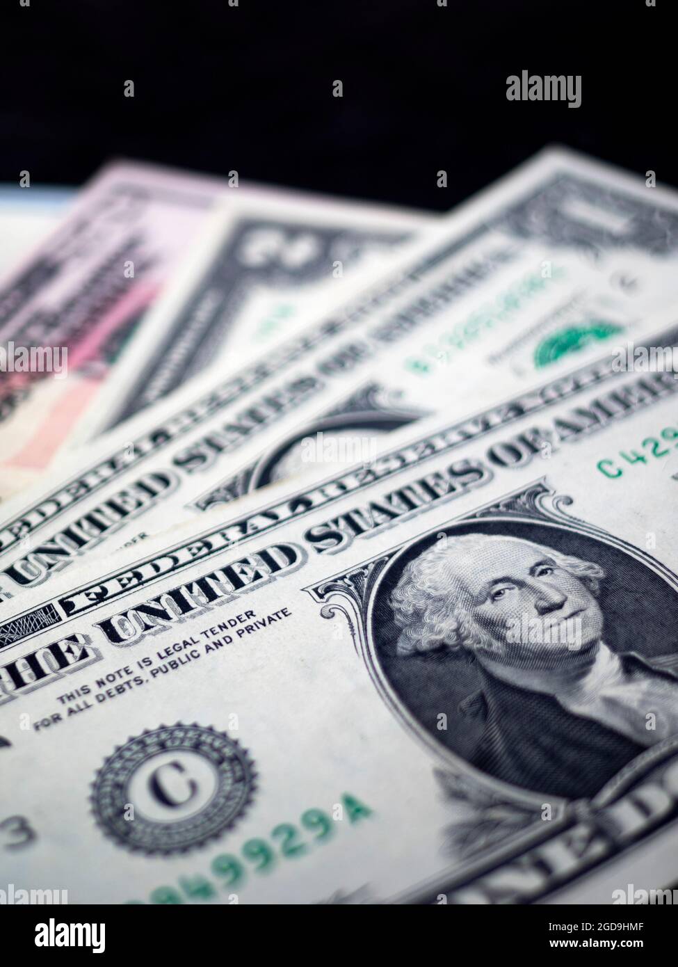 In this photo illustration background of various dollar bills Stock ...