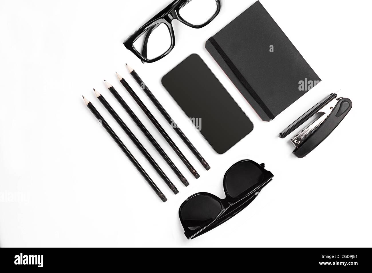 Mix of office supplies and business gadgets on a modern desk Stock ...