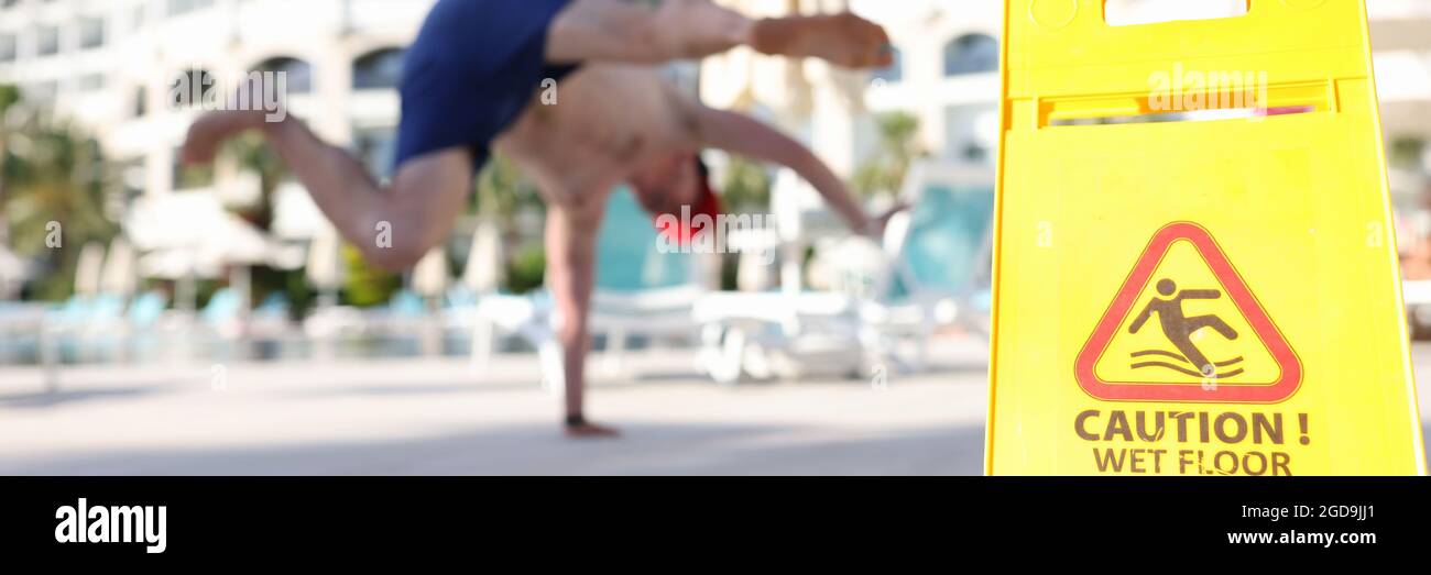 Man falling wet floor hi-res stock photography and images - Alamy