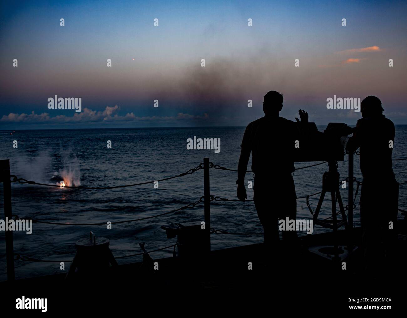 Gunner's Mate 1st Class Dustin Jones, right, from Dayton, Ohio ...