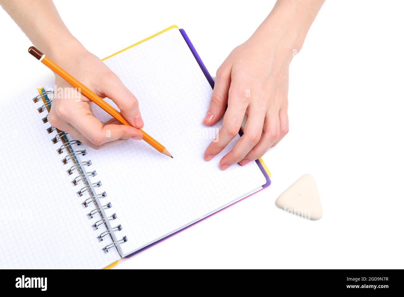 Human hands with pencil and erase rubber and notebook, isolated on ...