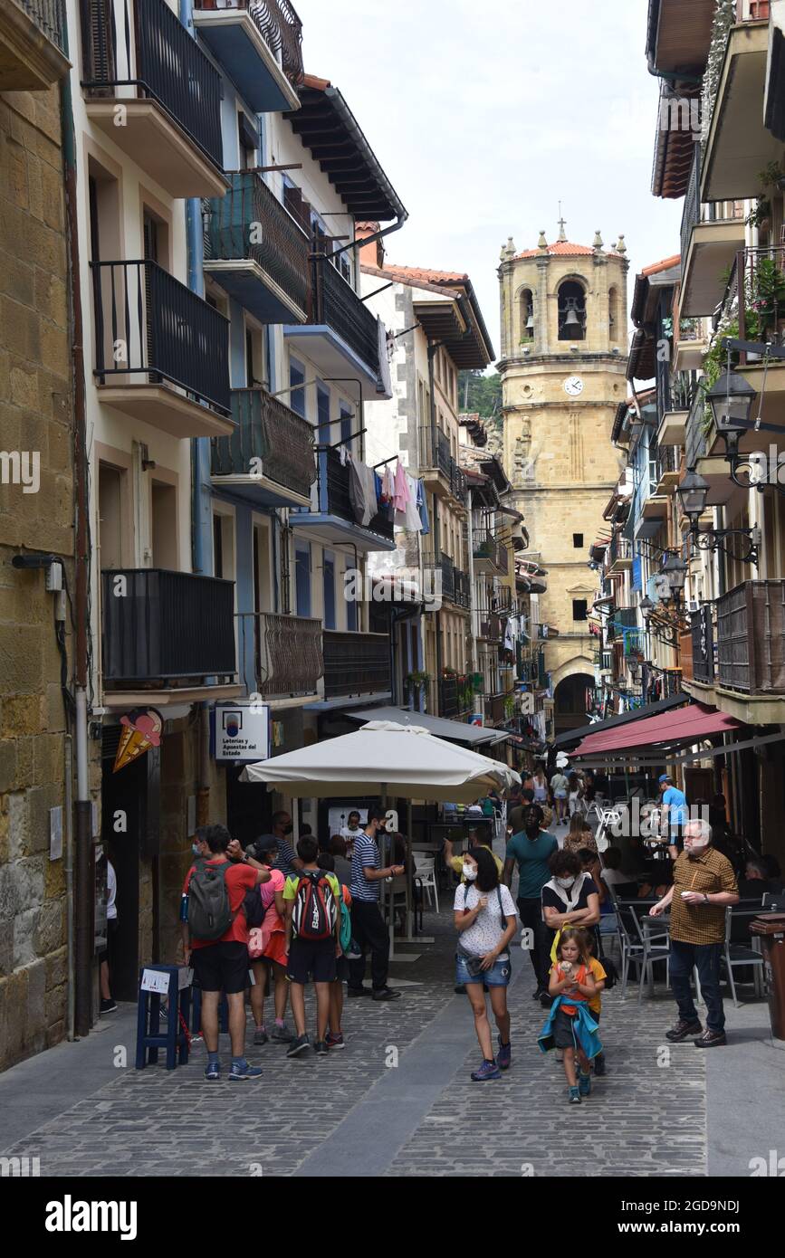 Getaria, Spain - 25 July 2021: Tourists and diners on Kale Nagusia ...