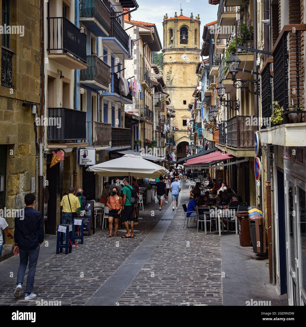 Getaria, Spain - 25 July 2021: Tourists and diners on Kale Nagusia ...
