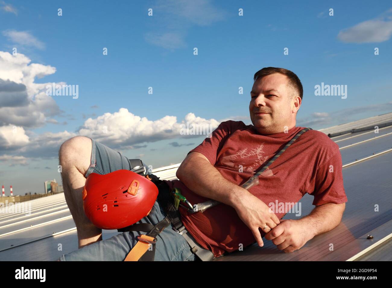 Man resting on roof hi-res stock photography and images - Alamy