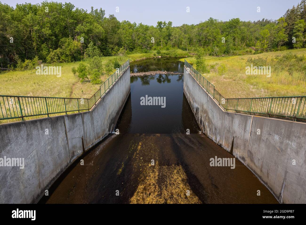 A dam with a river below Stock Photo - Alamy
