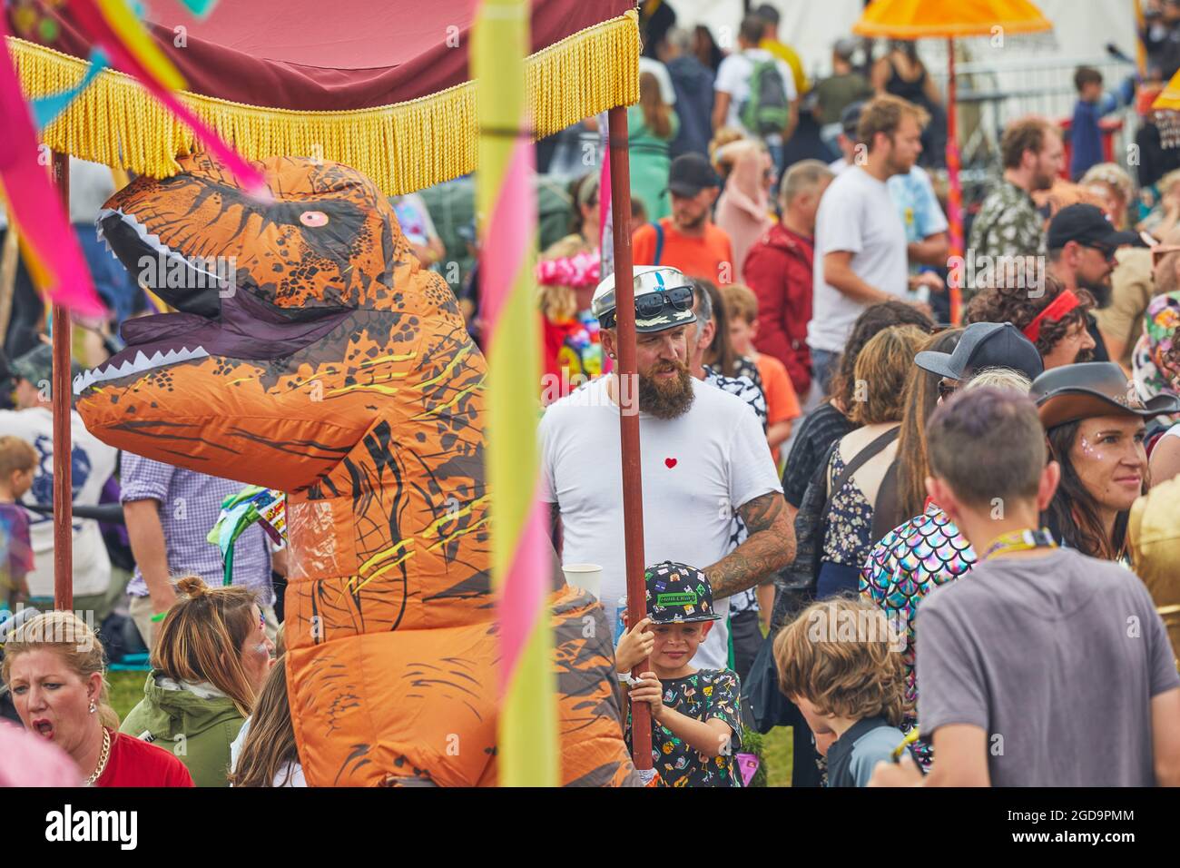 People in the crowd at a summer festival. Camp Bestival, Lulworth ...