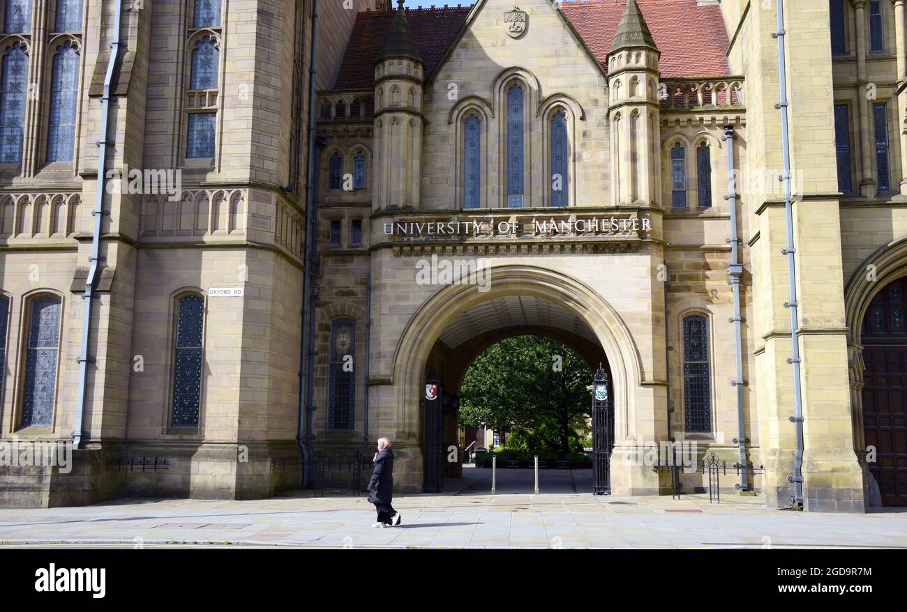 People walk past the Whitworth Building, University of Manchester ...
