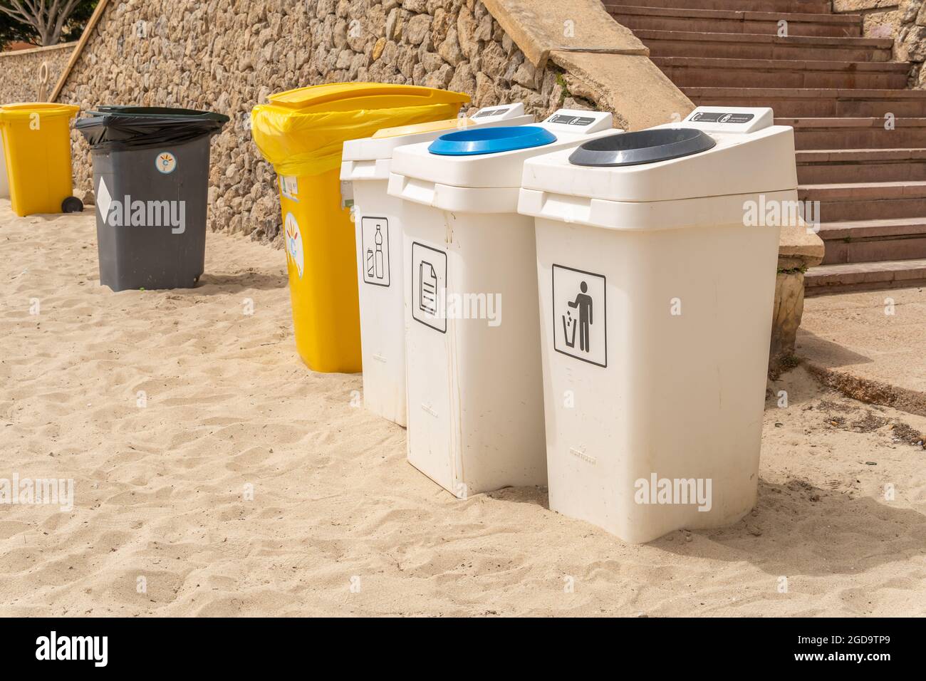Recycling garbage cans located on a beach on the island of Mallorca ...