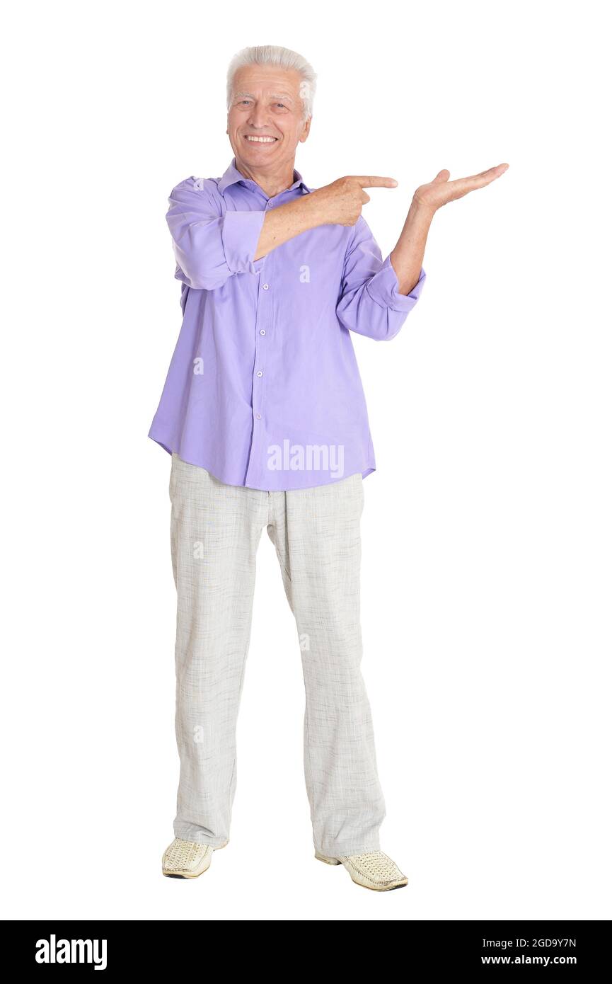 Senior handsome man showing something hi-res stock photography and ...