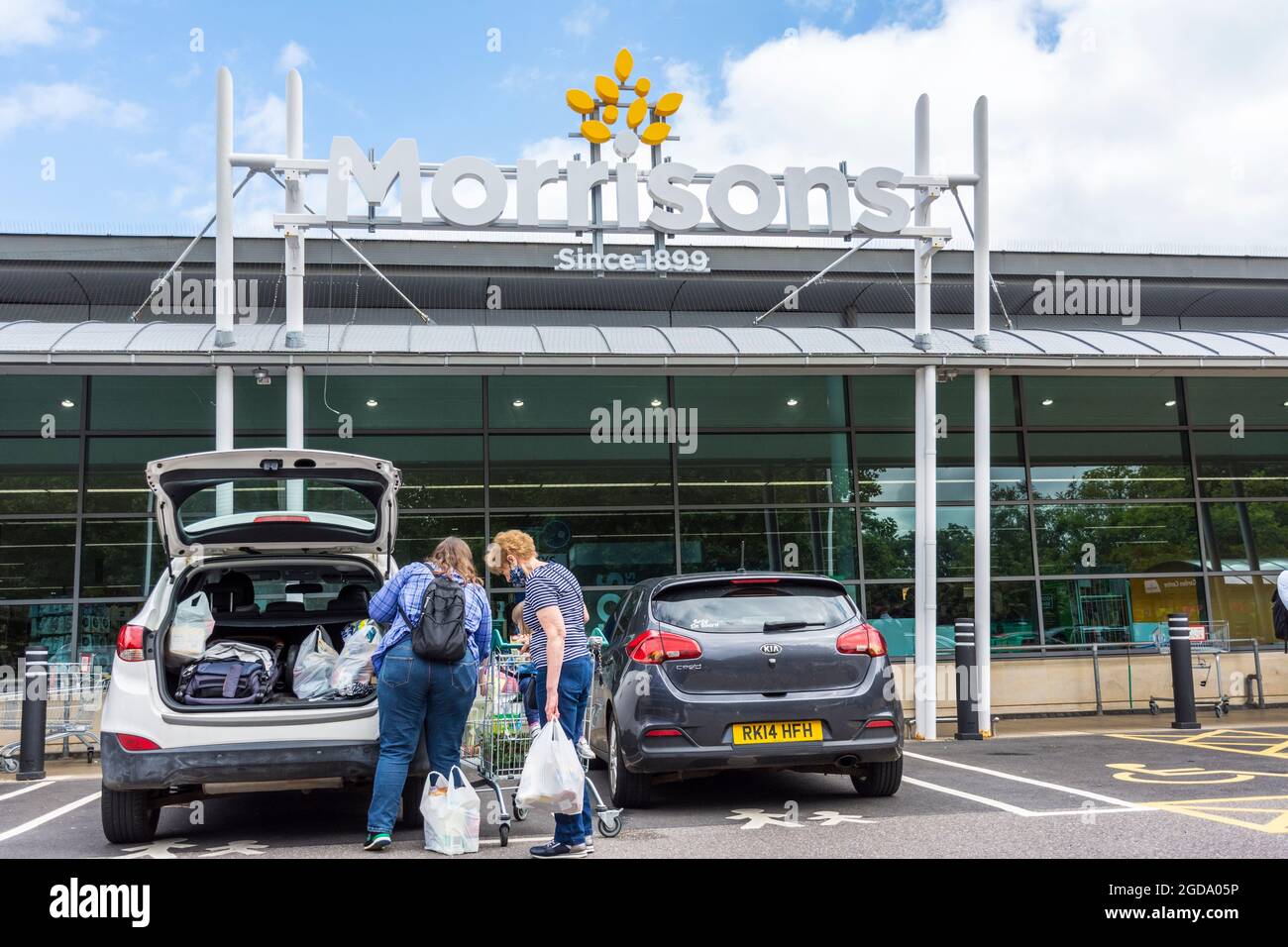 Shoppers at Morrisons supermarket car park, Bath, England, UK Stock ...