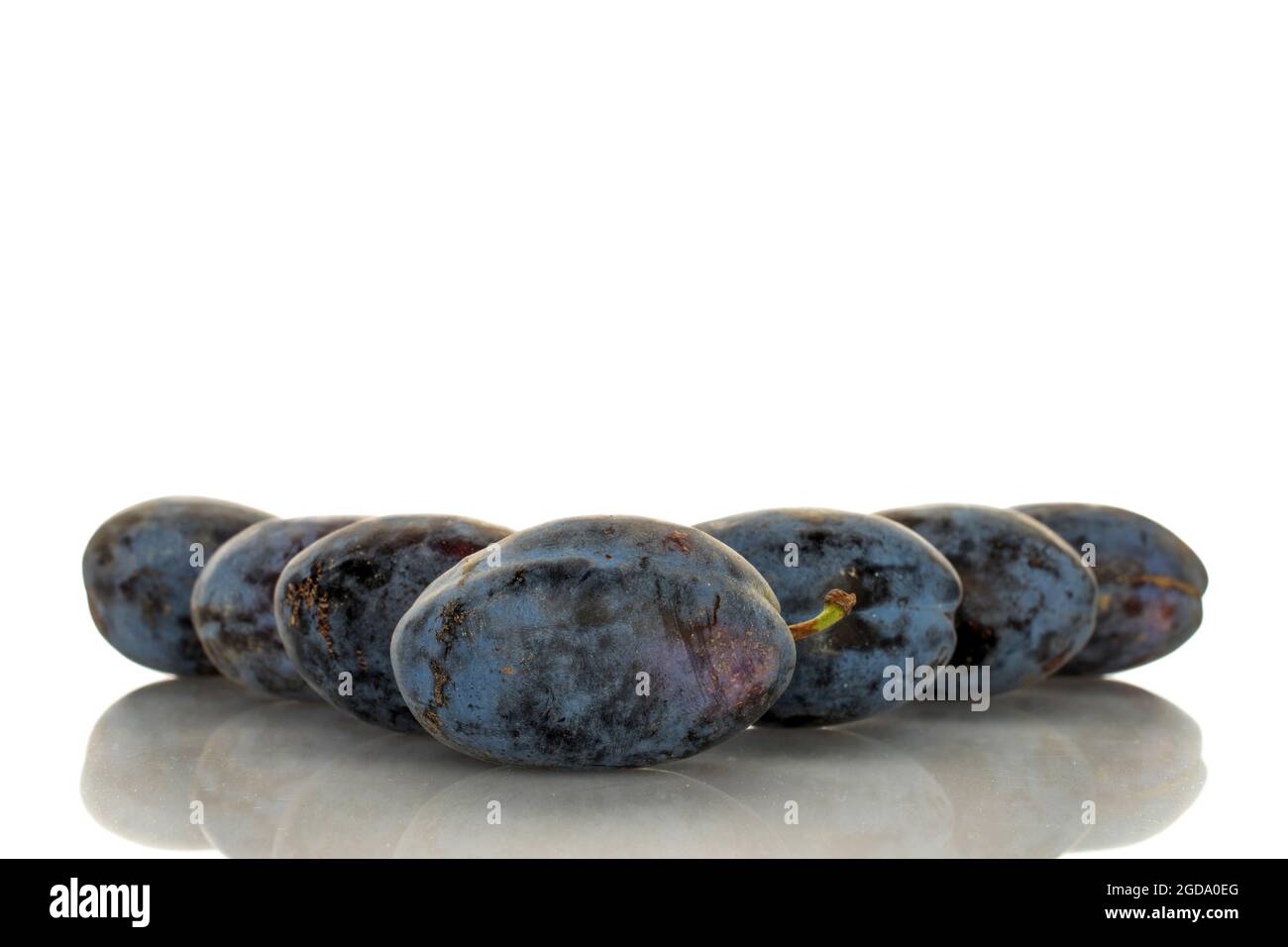 Several ripe organic Damson plums, close-up, isolated on white Stock ...