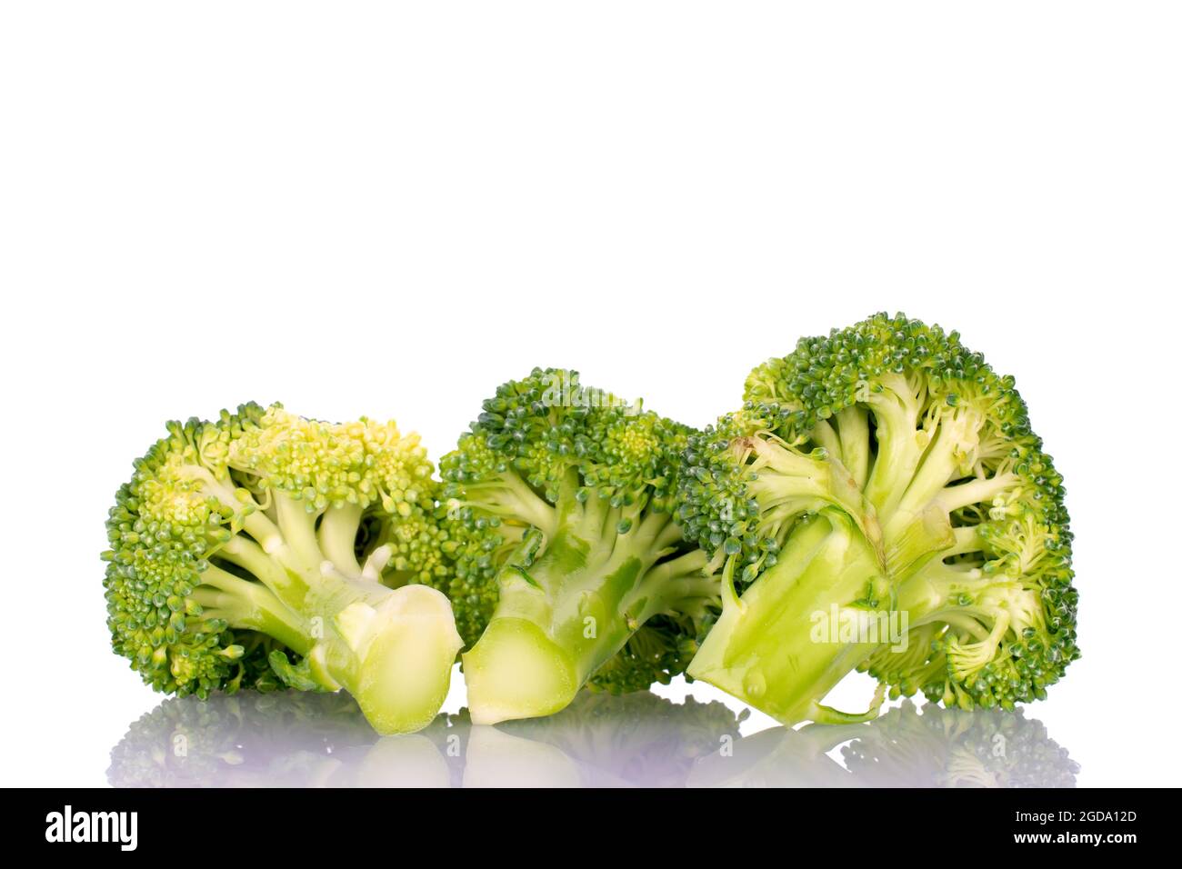 Green not cooked broccoli, close-up, on a white background Stock Photo ...