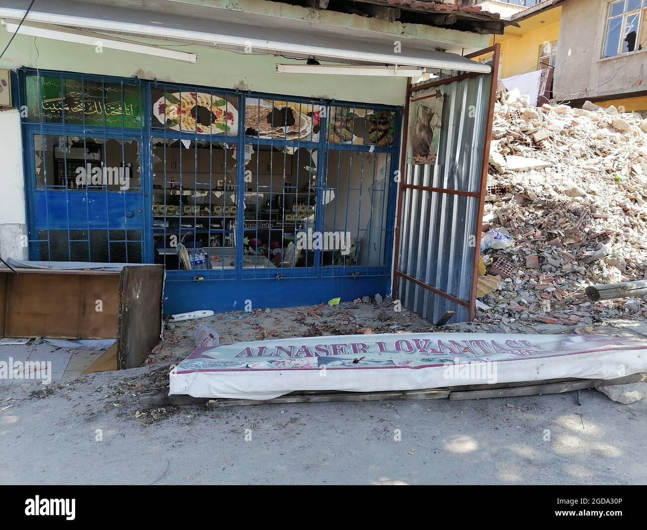 Dozens of angry Turkish people smashed up shops and cars believed to ...