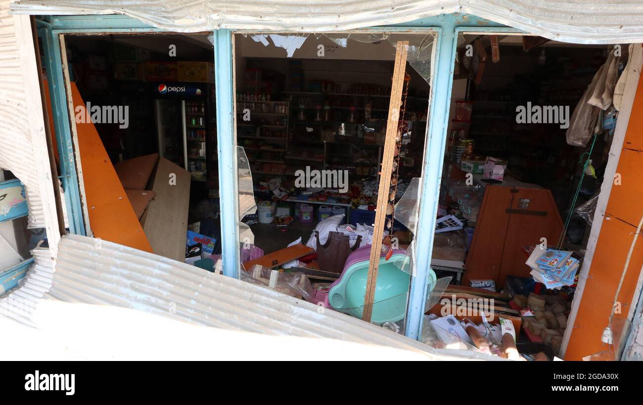 Dozens of angry Turkish people smashed up shops and cars believed to ...