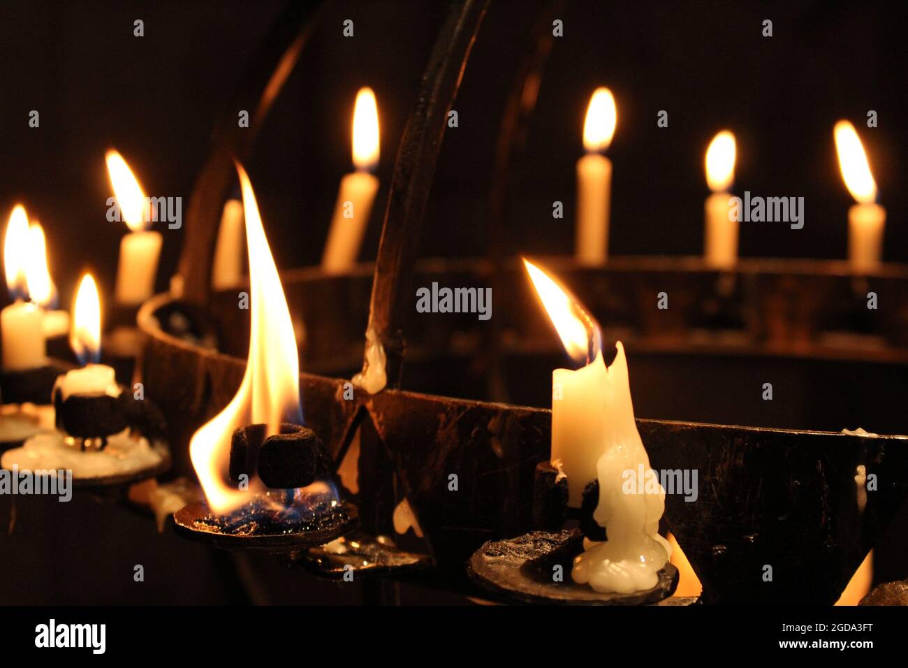 Burning candles at night Stock Photo - Alamy
