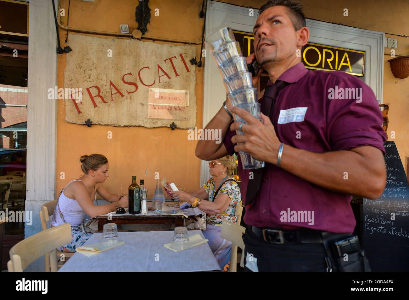 Male waiter italy hi-res stock photography and images - Alamy